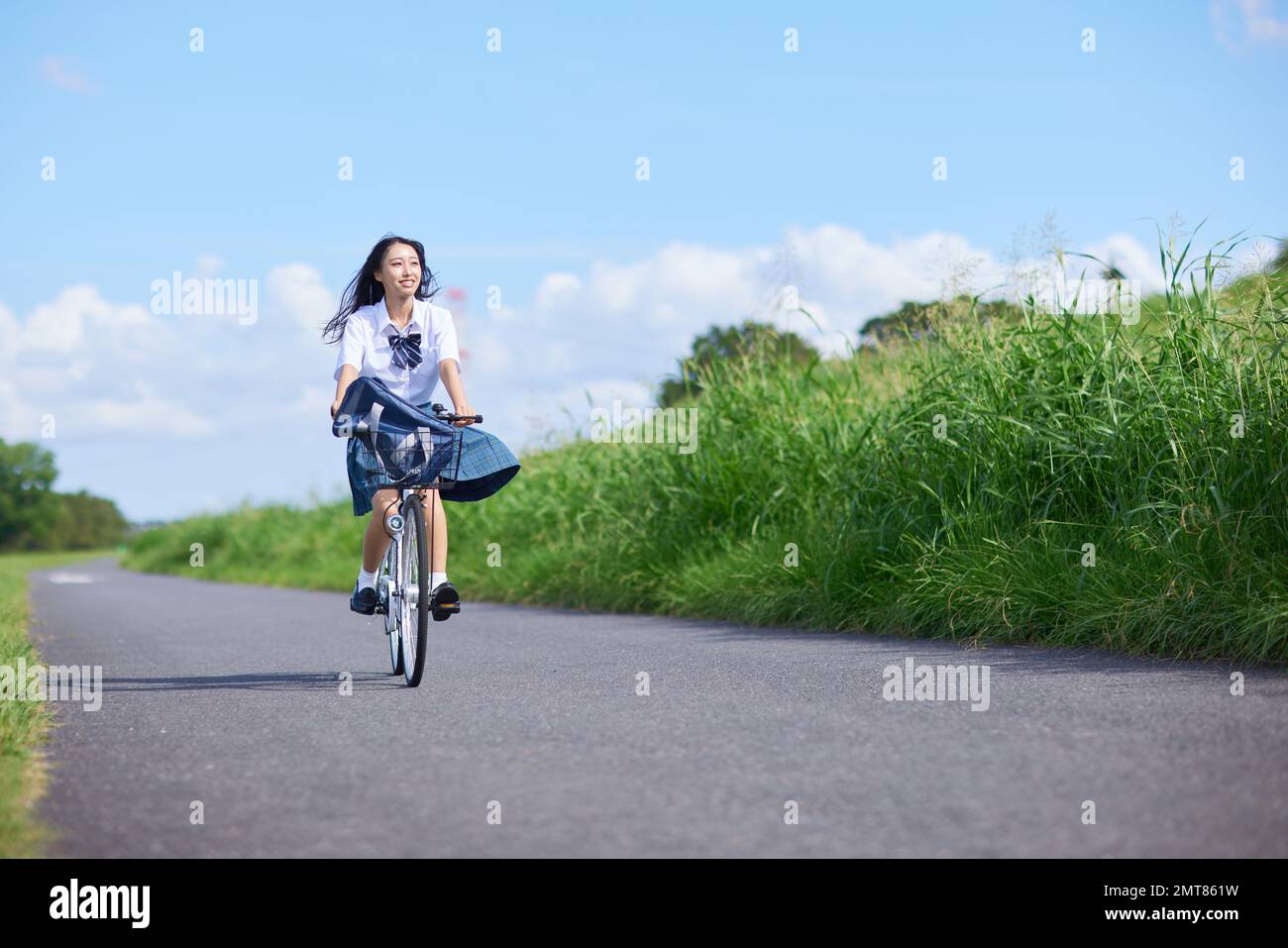 Japanese high school student on a bike outdoors Stock Photo - Alamy