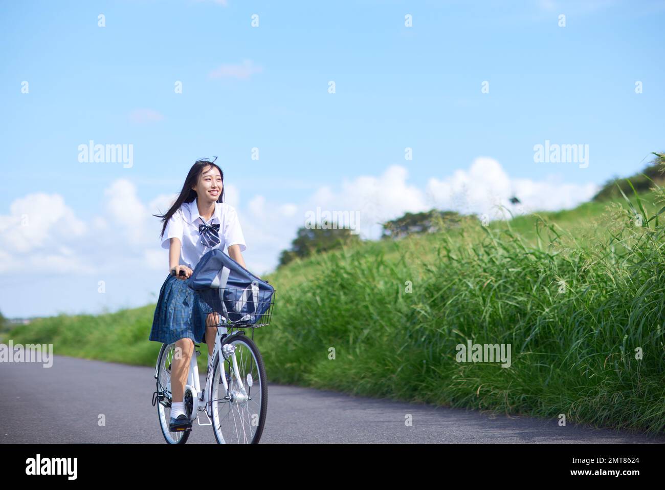 Japanese high school student on a bike outdoors Stock Photo - Alamy
