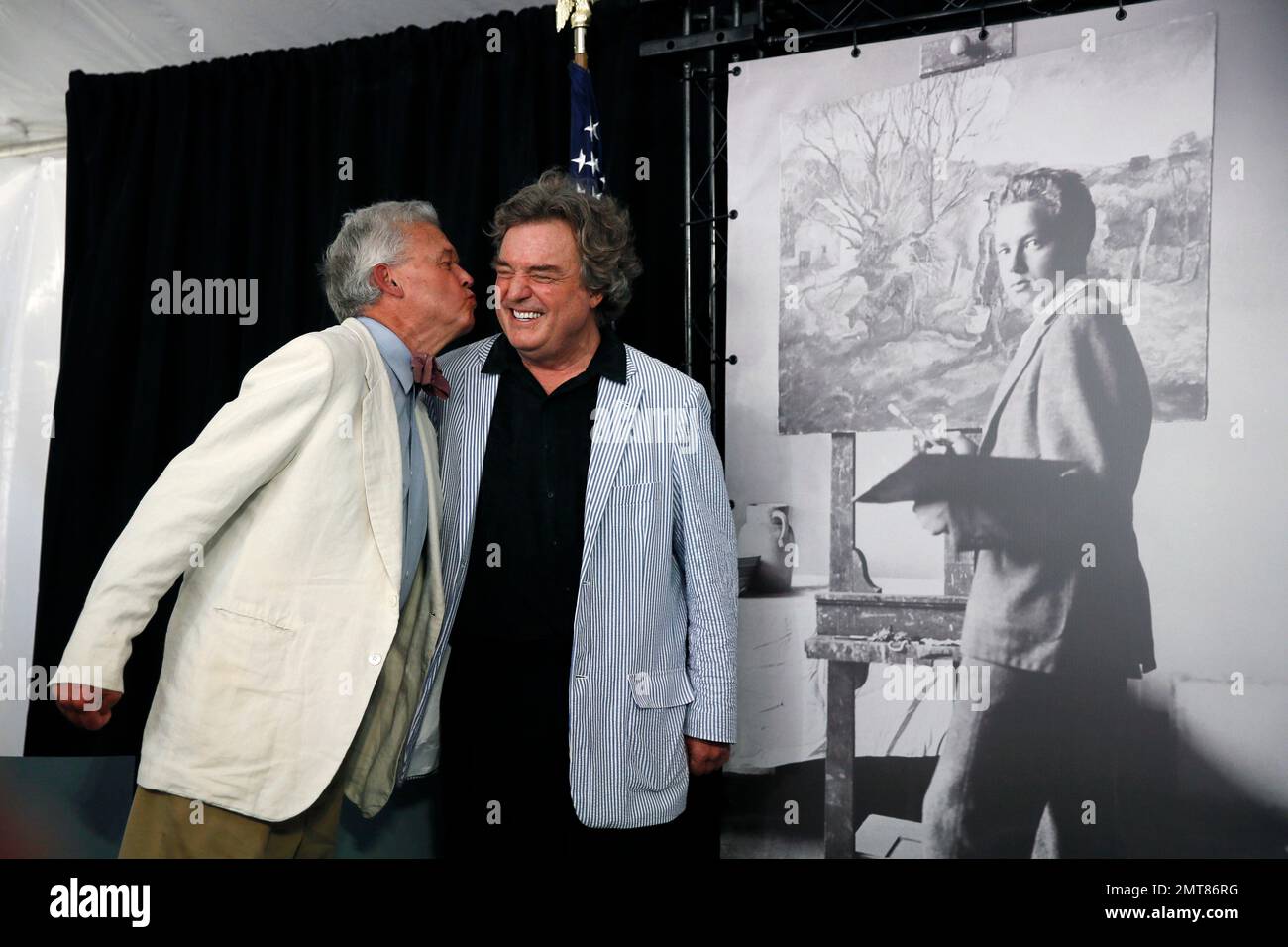 Nicholas Wyeth, left, kisses his brother Jaime Wyeth during a First-Day ...
