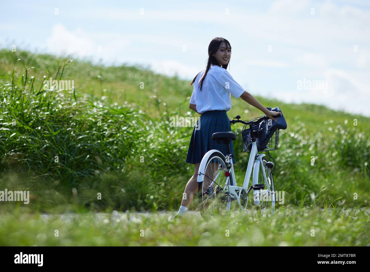 Japanese high school student on a bike outdoors Stock Photo - Alamy