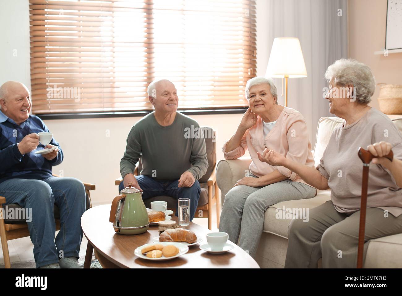 Elderly people spending time in geriatric hospice. Senior patients care ...