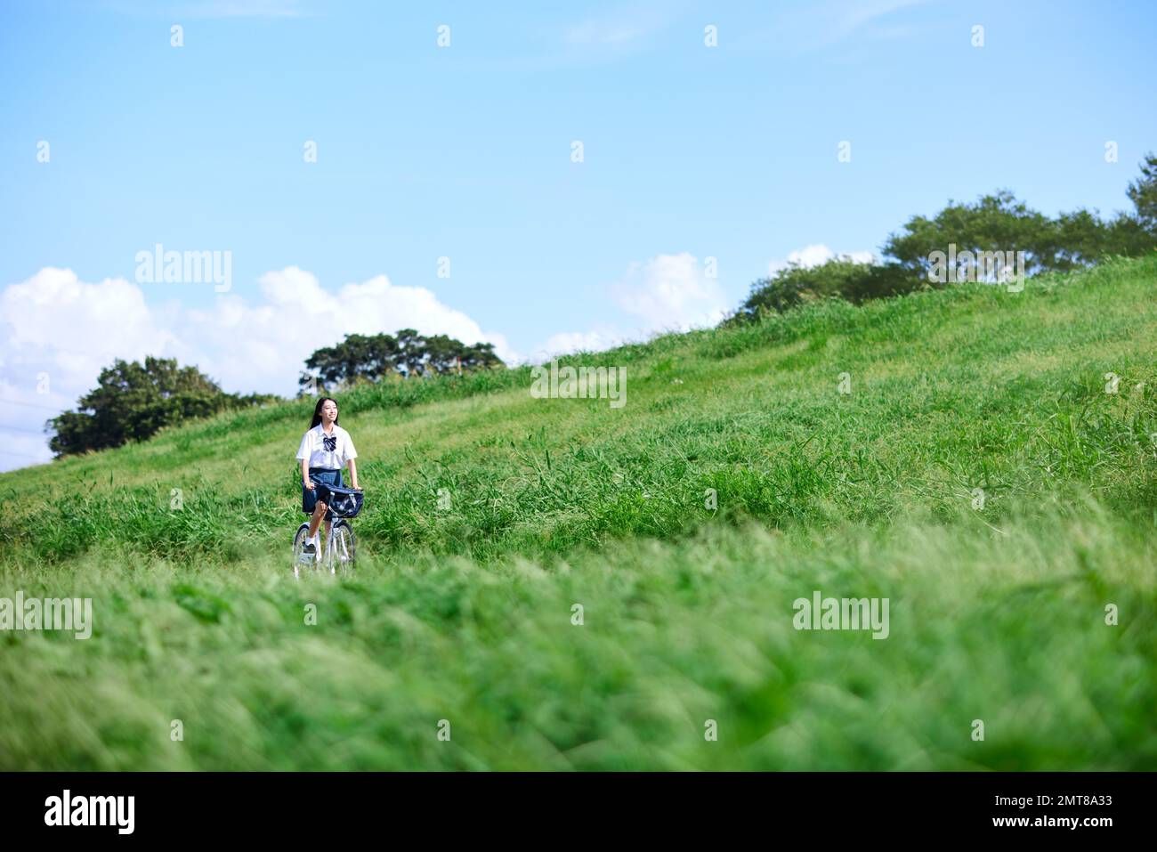 Japanese high school student on a bike outdoors Stock Photo - Alamy