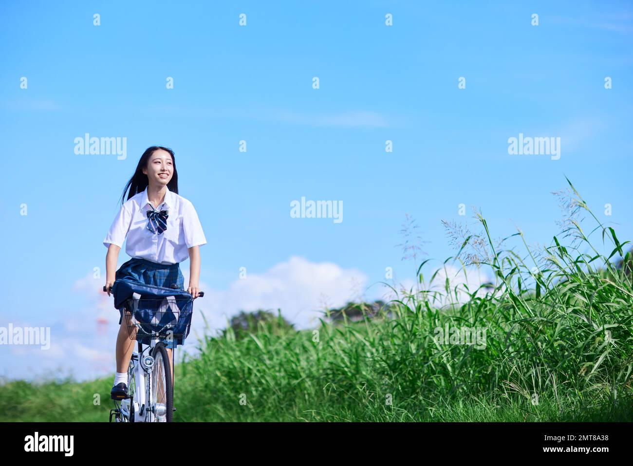 Japanese high school student on a bike outdoors Stock Photo - Alamy