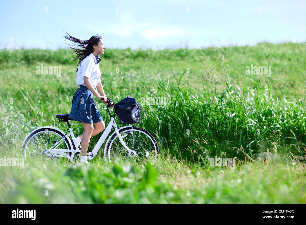 Japanese high school student on a bike outdoors Stock Photo - Alamy