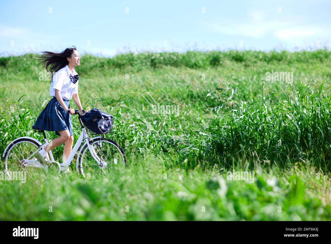 Japanese high school student on a bike outdoors Stock Photo - Alamy