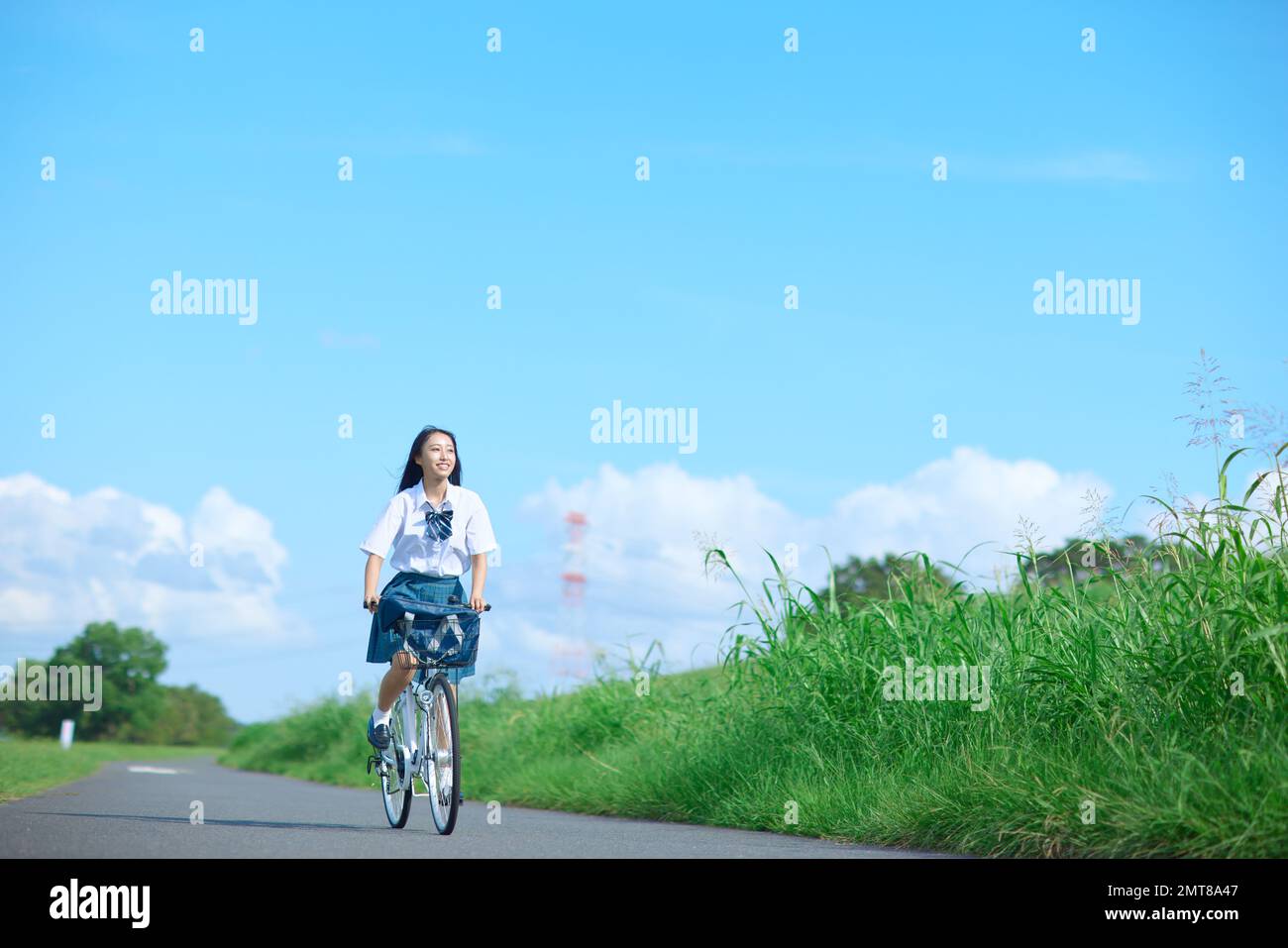 Japanese high school student on a bike outdoors Stock Photo - Alamy
