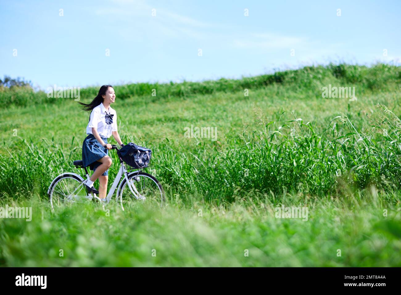Japanese high school student on a bike outdoors Stock Photo - Alamy