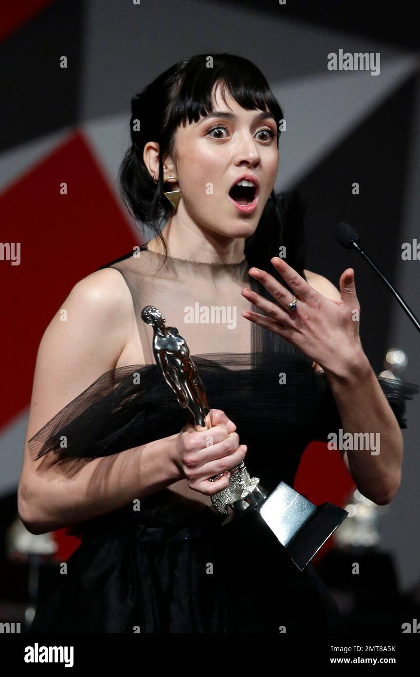 Maria Evoli reacts as she receives the best new actress award for ...