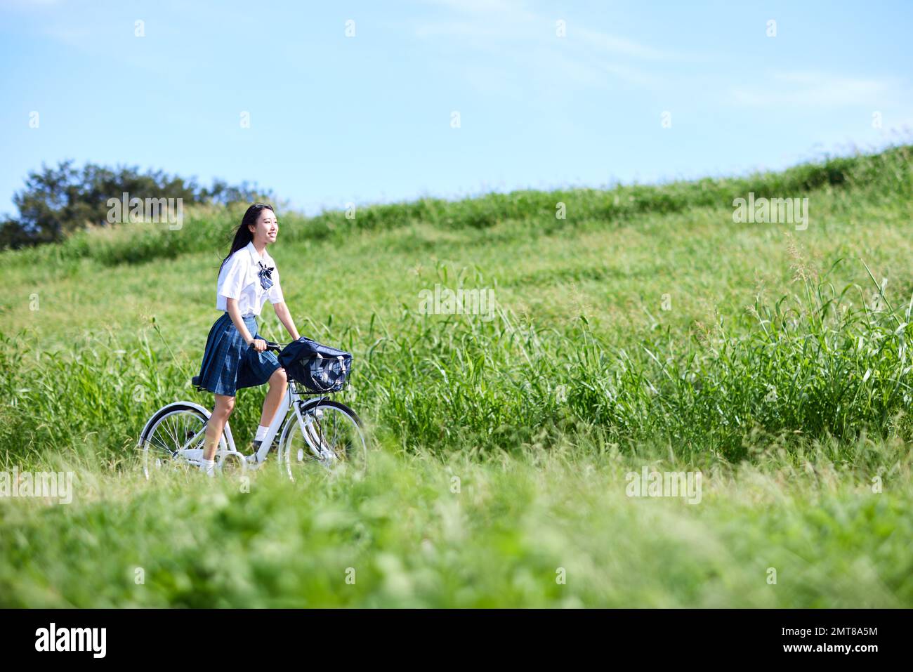Japanese high school student on a bike outdoors Stock Photo - Alamy