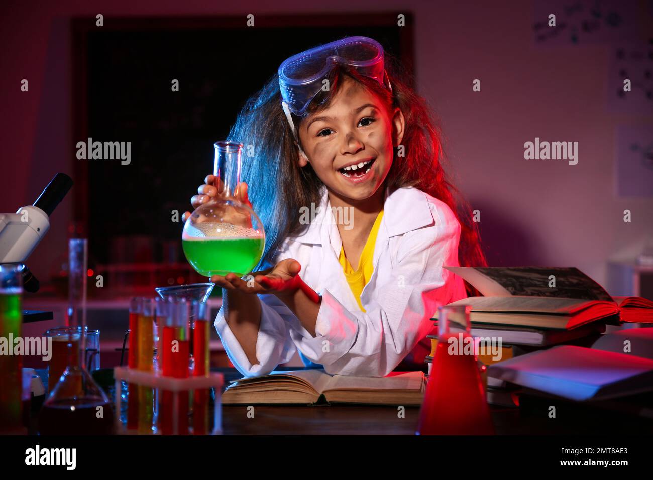 Child doing chemical research in laboratory. Dangerous experiment Stock ...