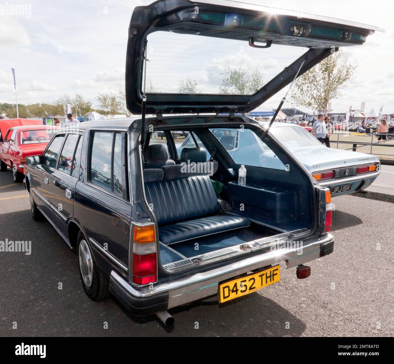 Three-Quarters Rear View of a Dark Blue, 1986, Nissan 300C 'Cedric ...