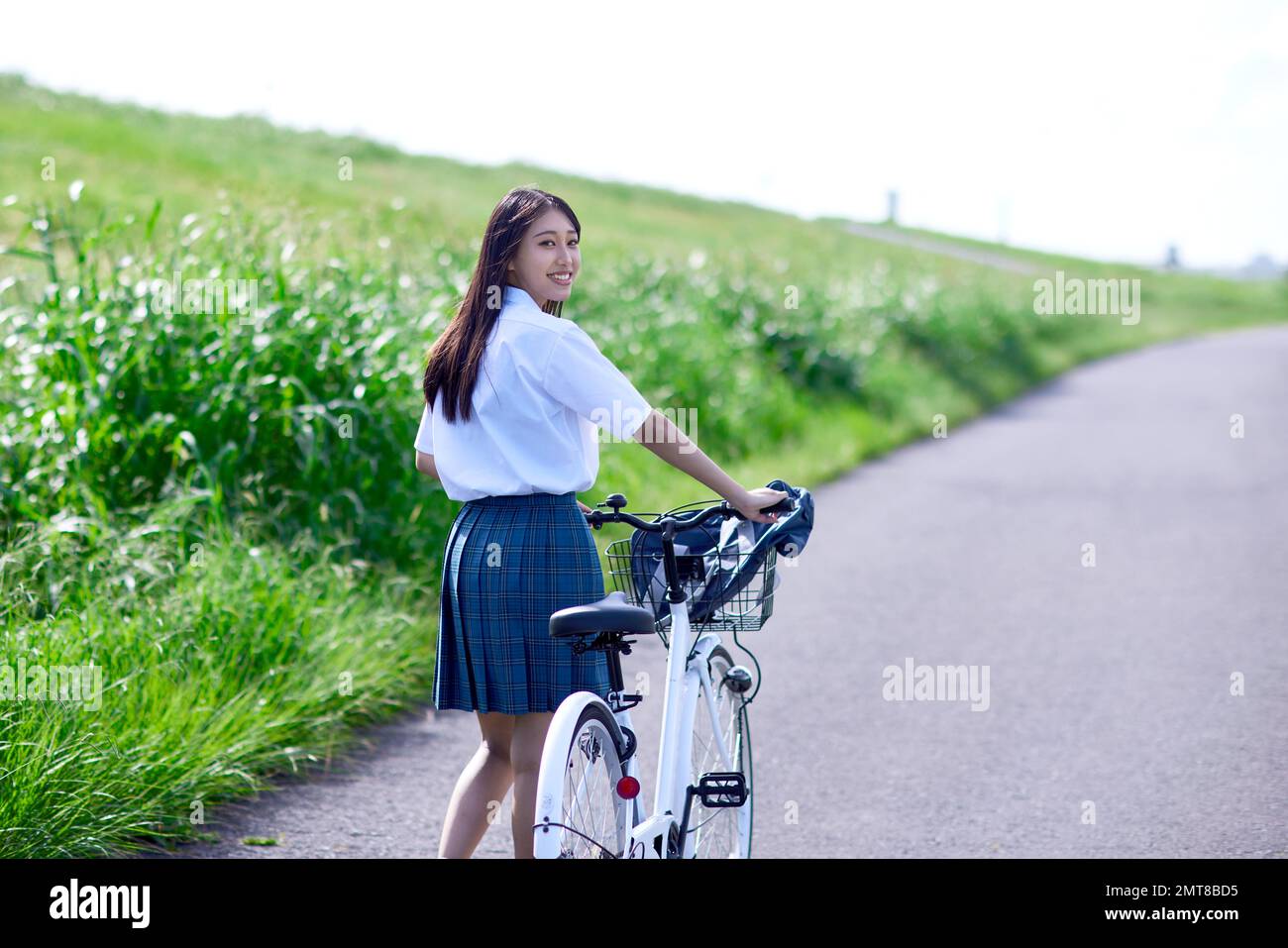 Japanese high school student on a bike outdoors Stock Photo - Alamy