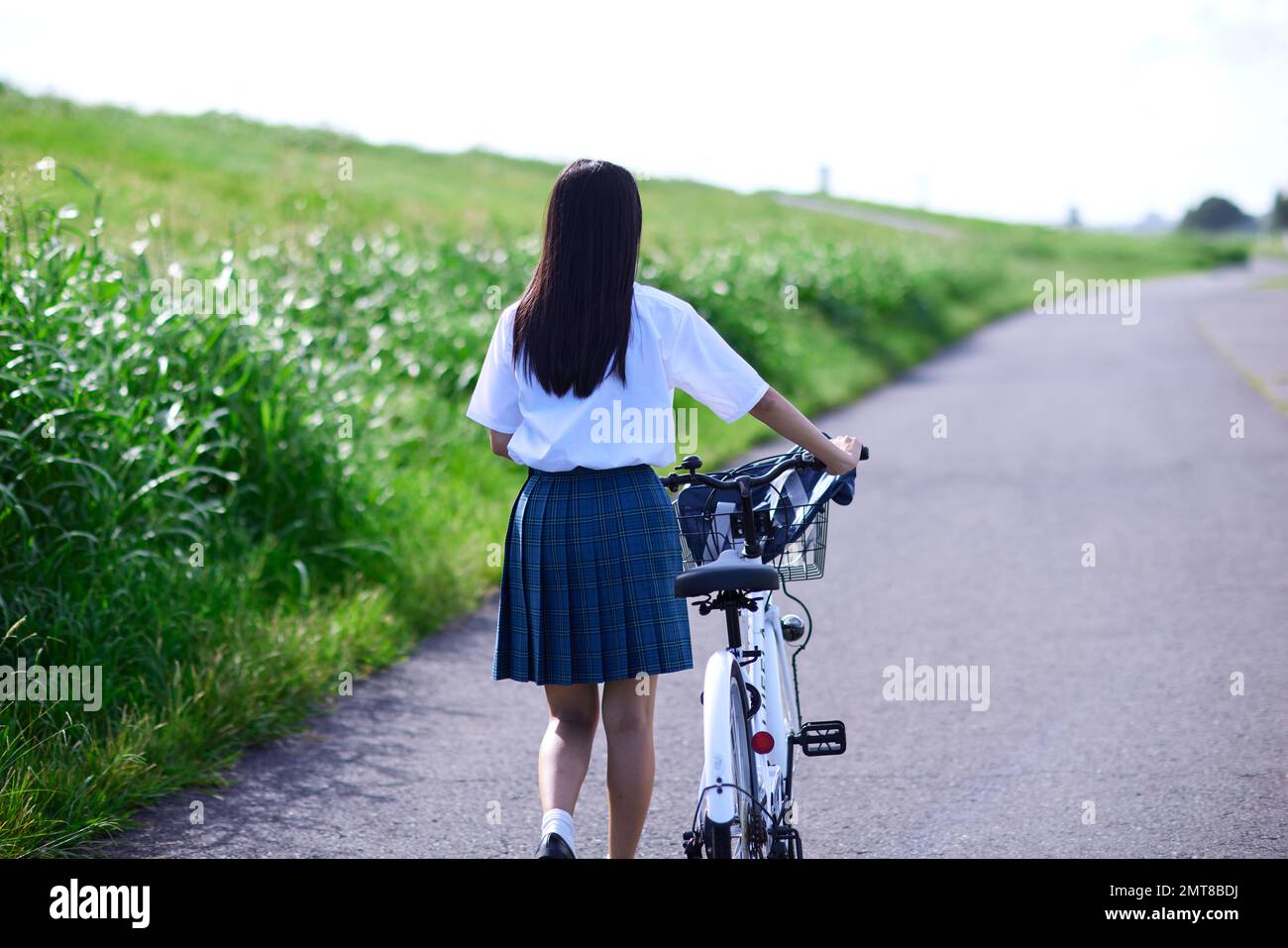 Japanese high school student on a bike outdoors Stock Photo - Alamy