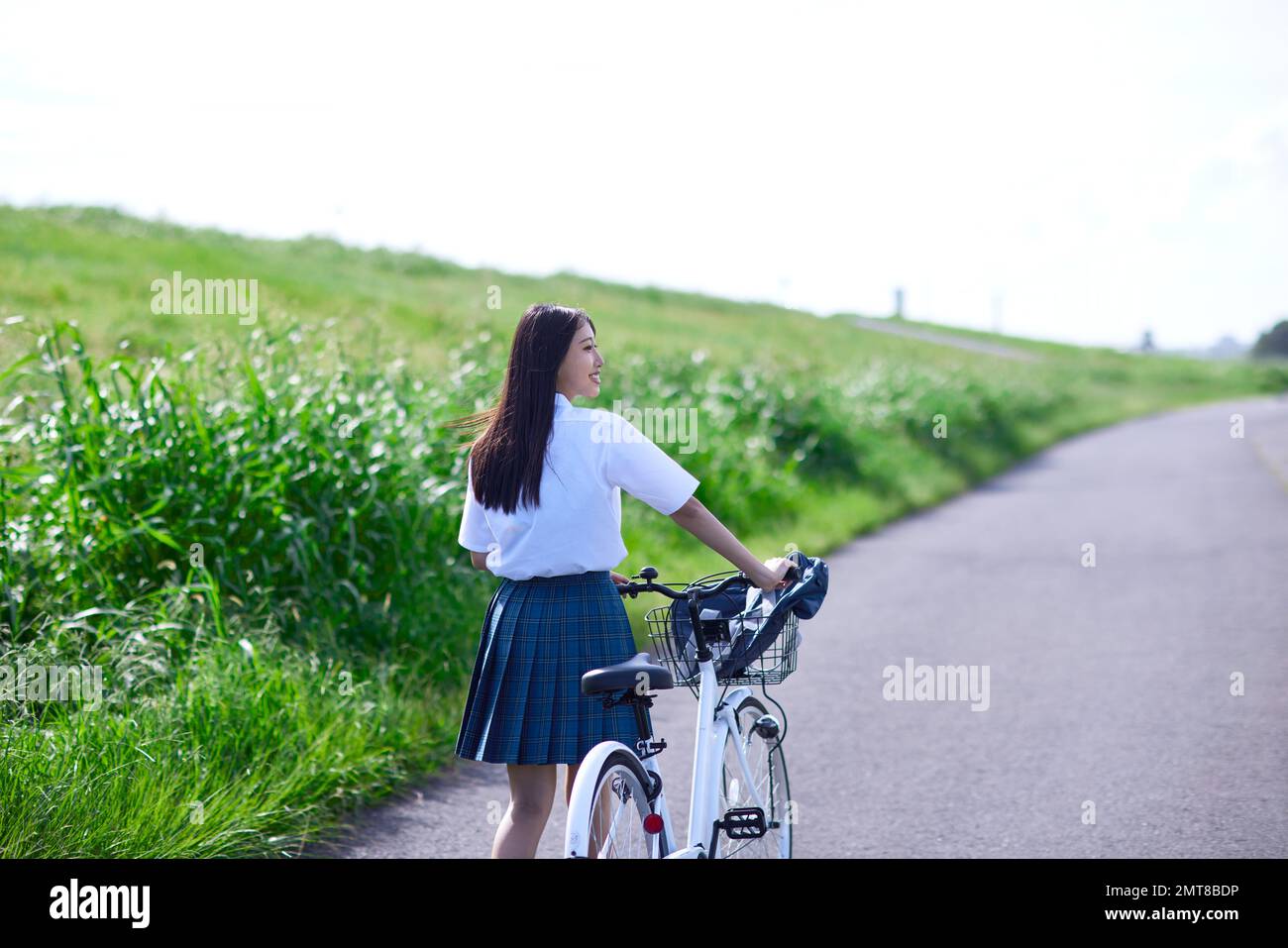 Japanese high school student on a bike outdoors Stock Photo - Alamy