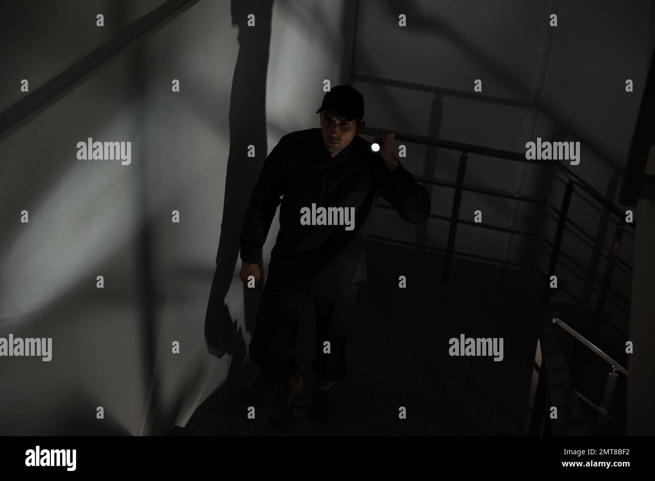 Worker is going up stairs hi-res stock photography and images - Alamy