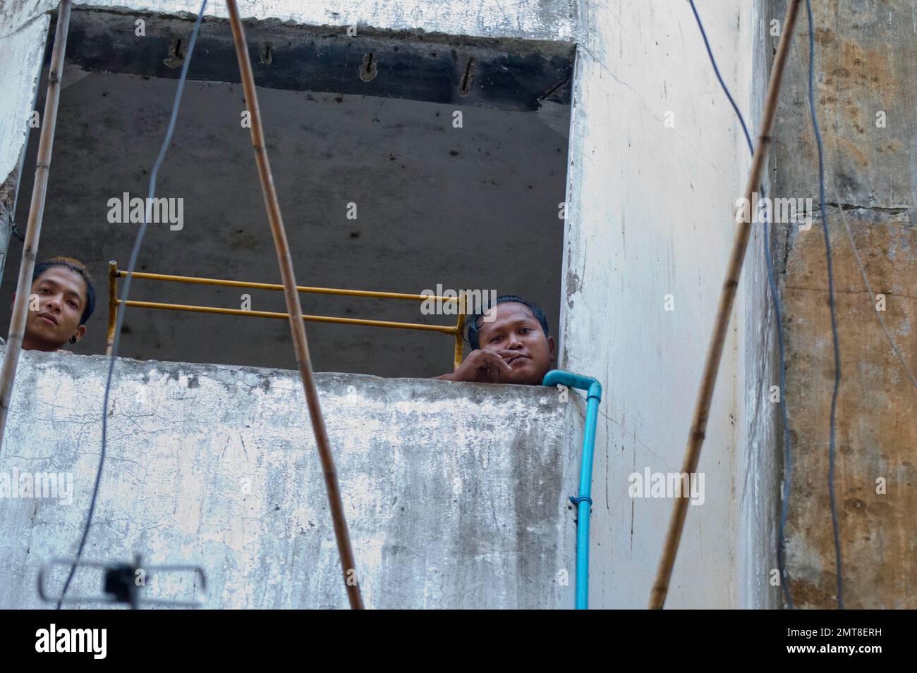 In this April 11, 2017 photo, former enslaved fishermen Phyo Kyaw, left ...