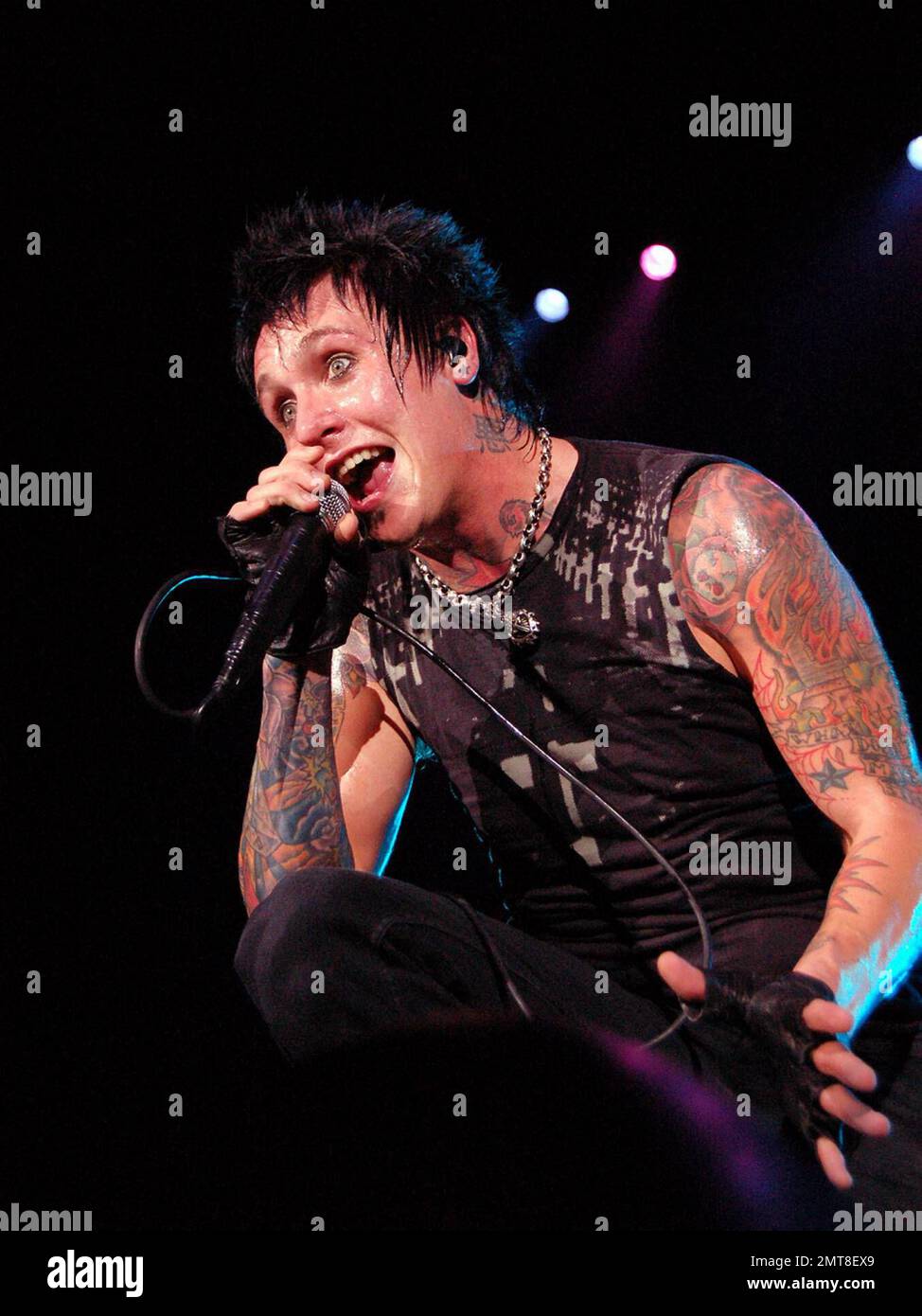 Papa Roach performs at 103.1 FM's Buzz Bake Sale at the Sound Advice ...