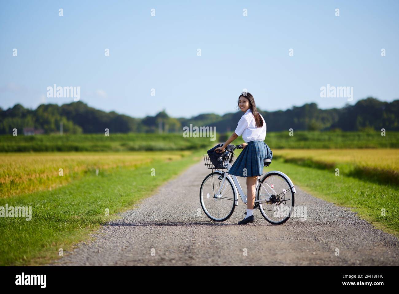 Japanese high school student on a bike outdoors Stock Photo - Alamy