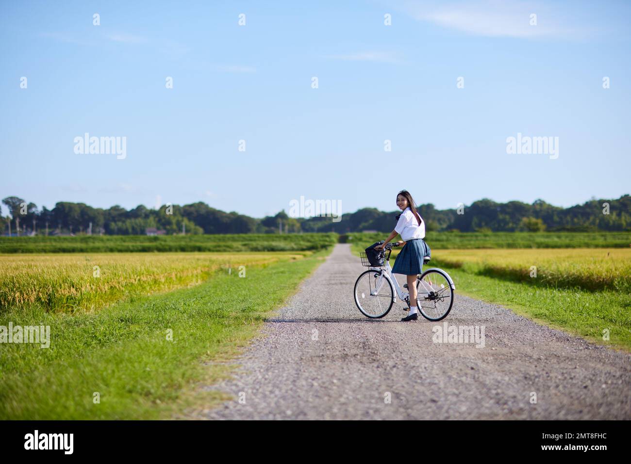 Japanese high school student on a bike outdoors Stock Photo - Alamy