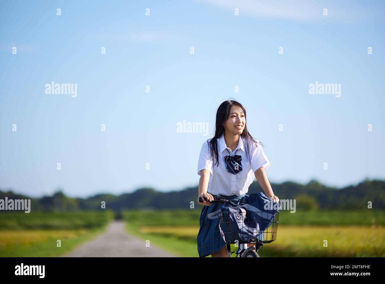Japanese high school student on a bike outdoors Stock Photo - Alamy