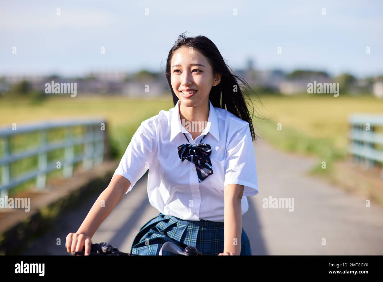 Japanese high school student on a bike outdoors Stock Photo - Alamy
