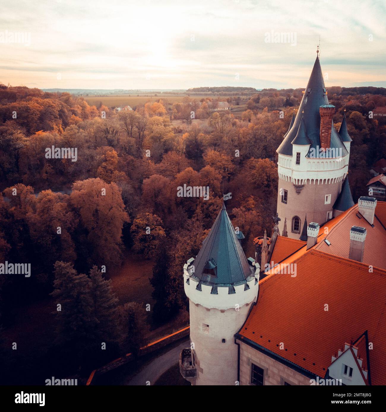 An aerial view of Chateau Zleby in the beautiful countryside by forests ...