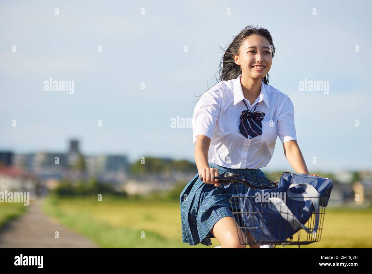 Japanese high school student on a bike outdoors Stock Photo - Alamy
