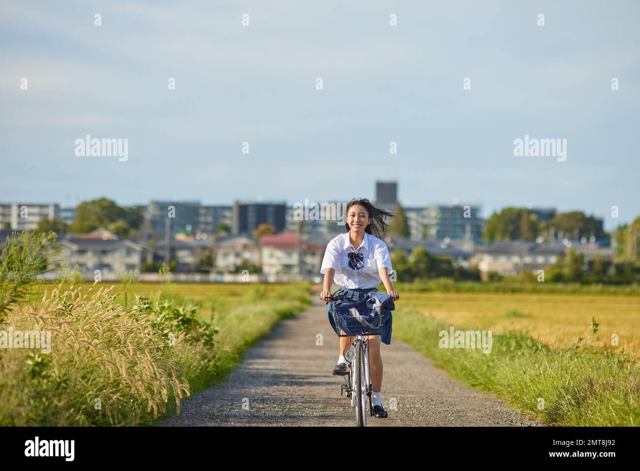 Japanese high school student on a bike outdoors Stock Photo - Alamy