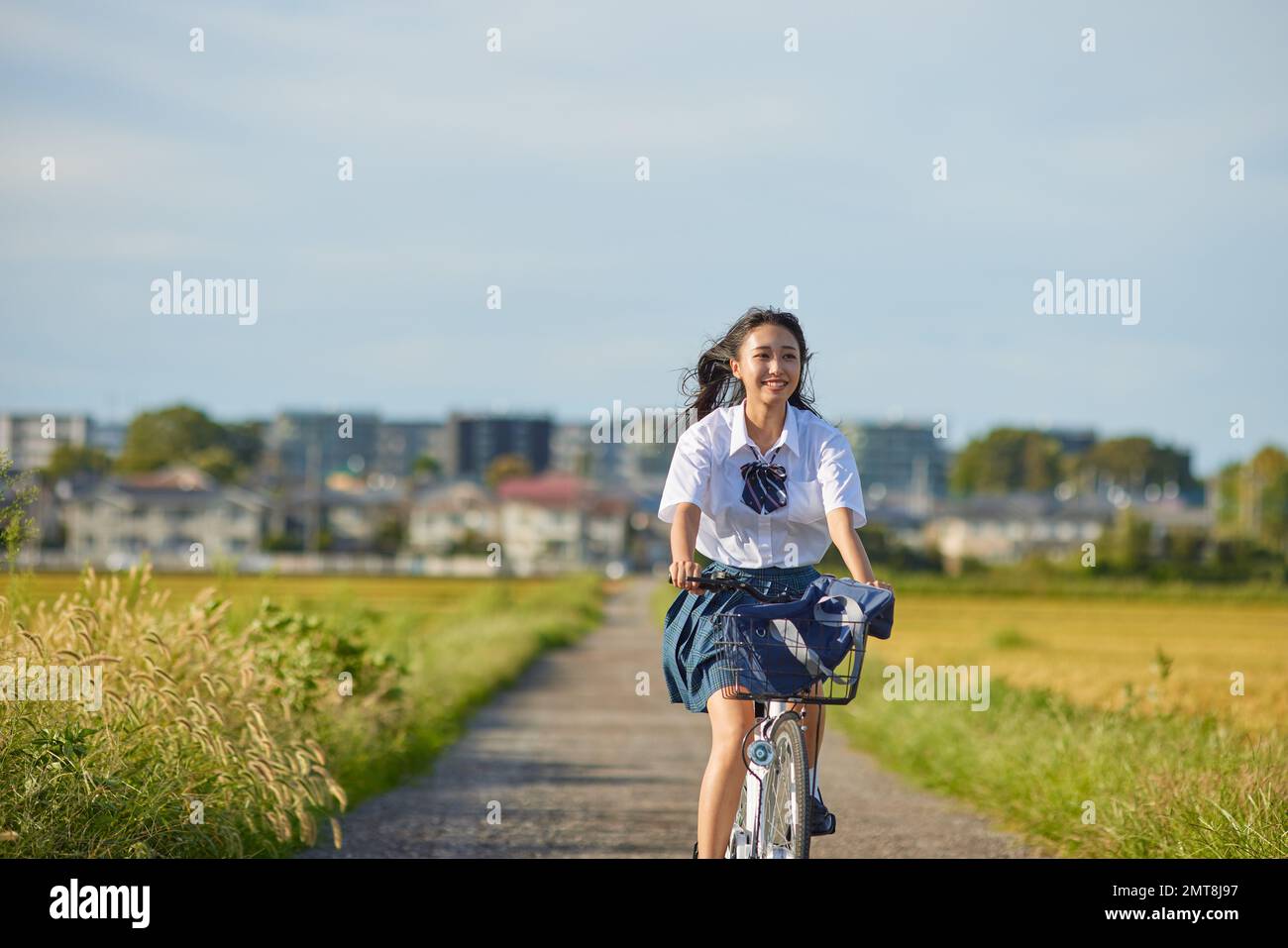 Japanese high school student on a bike outdoors Stock Photo - Alamy