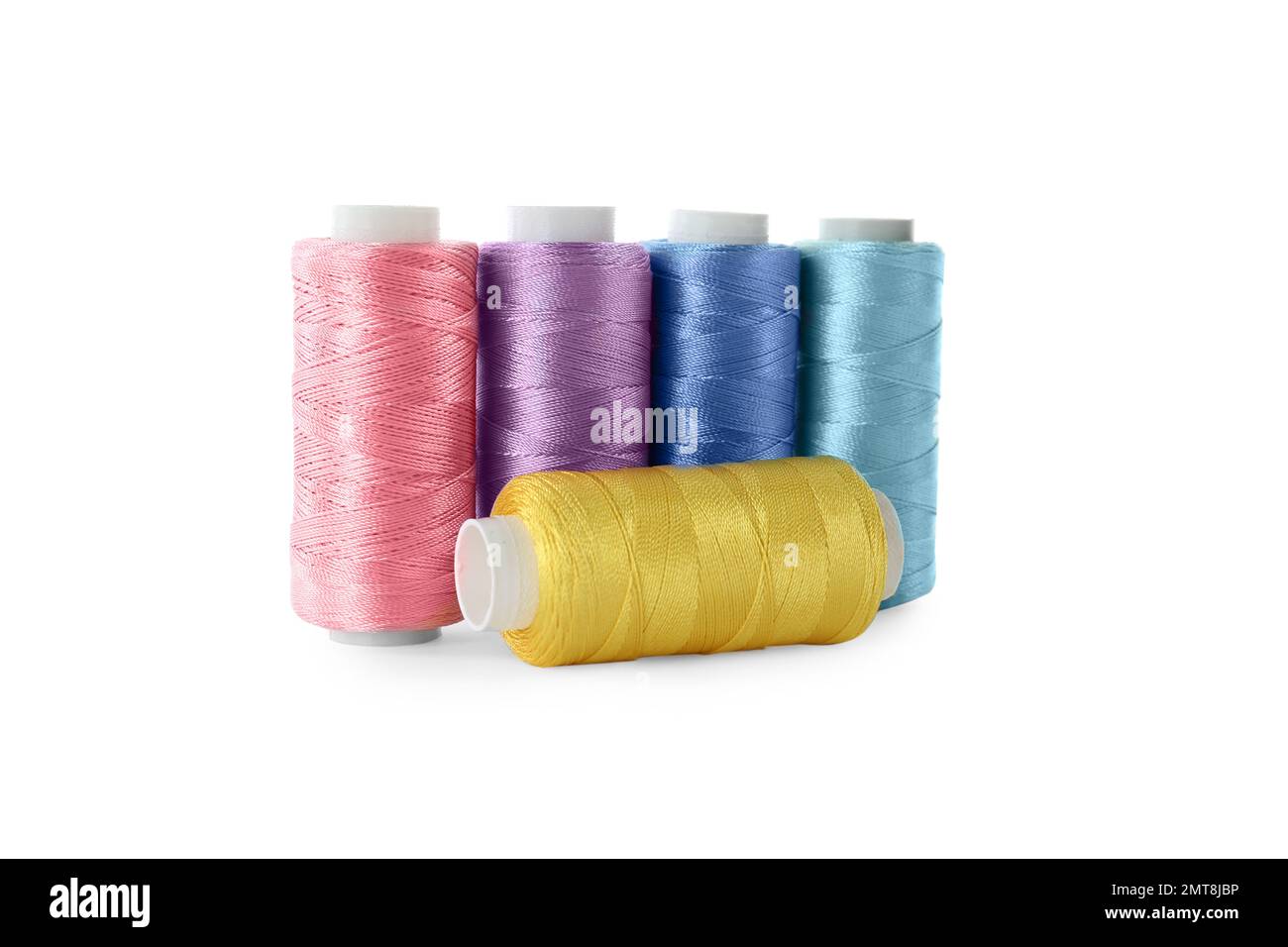 Set of color sewing threads isolated on white Stock Photo - Alamy