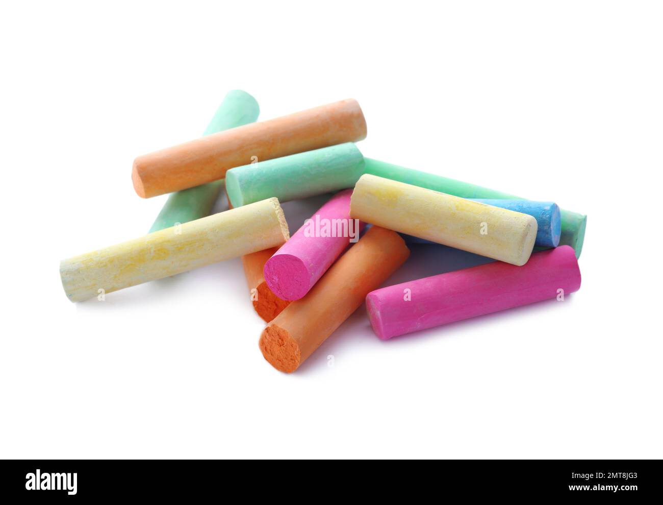 Color pieces of chalk on white background Stock Photo - Alamy