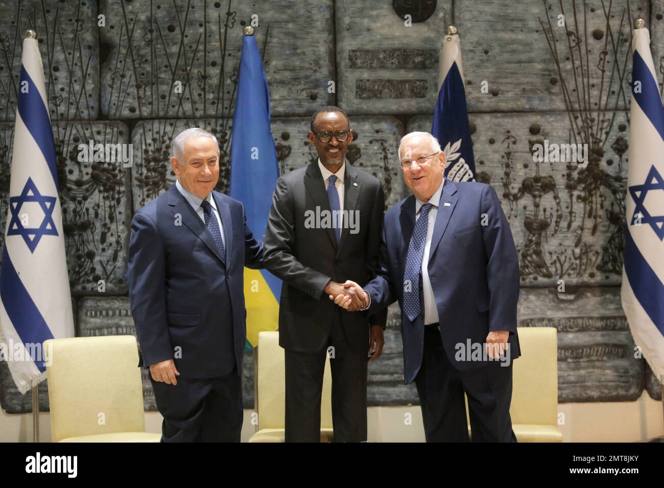 Rwanda's President, Paul Kagame, center, Israel's President Reuven Rivlin right, and Israeli ...