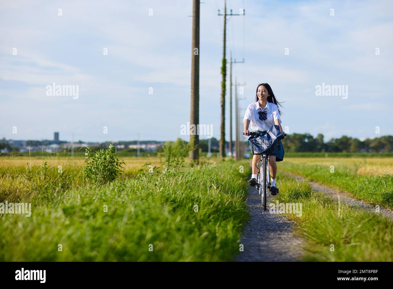 Japanese high school student on a bike outdoors Stock Photo - Alamy