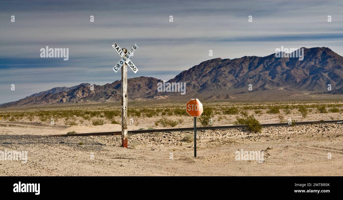 Railway crossing, Cadiz Road, Ship Mountains in distance, Mojave Desert ...