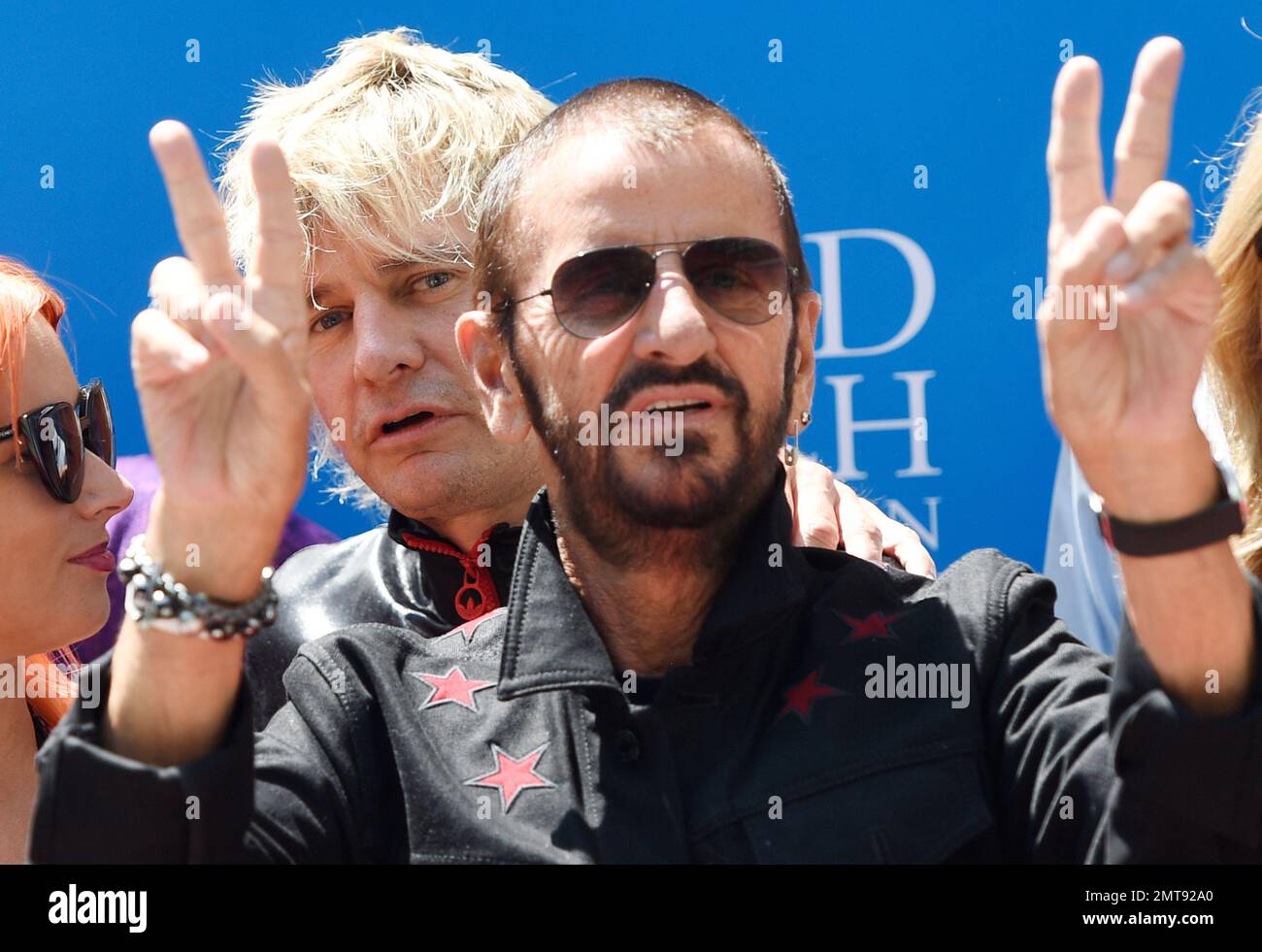 Ringo Starr is joined by his son Zak Starkey onstage during a 77th ...