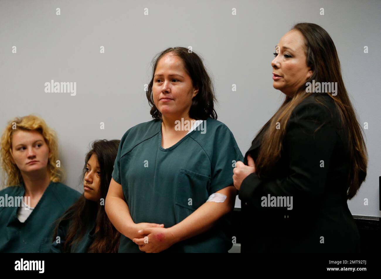 Isabel Martinez second from right is shown during her first court ...