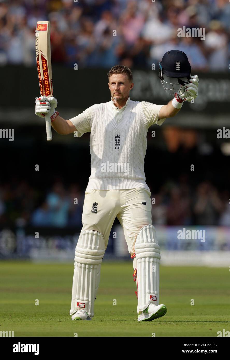 England captain Joe Root celebrates his century during the first test ...