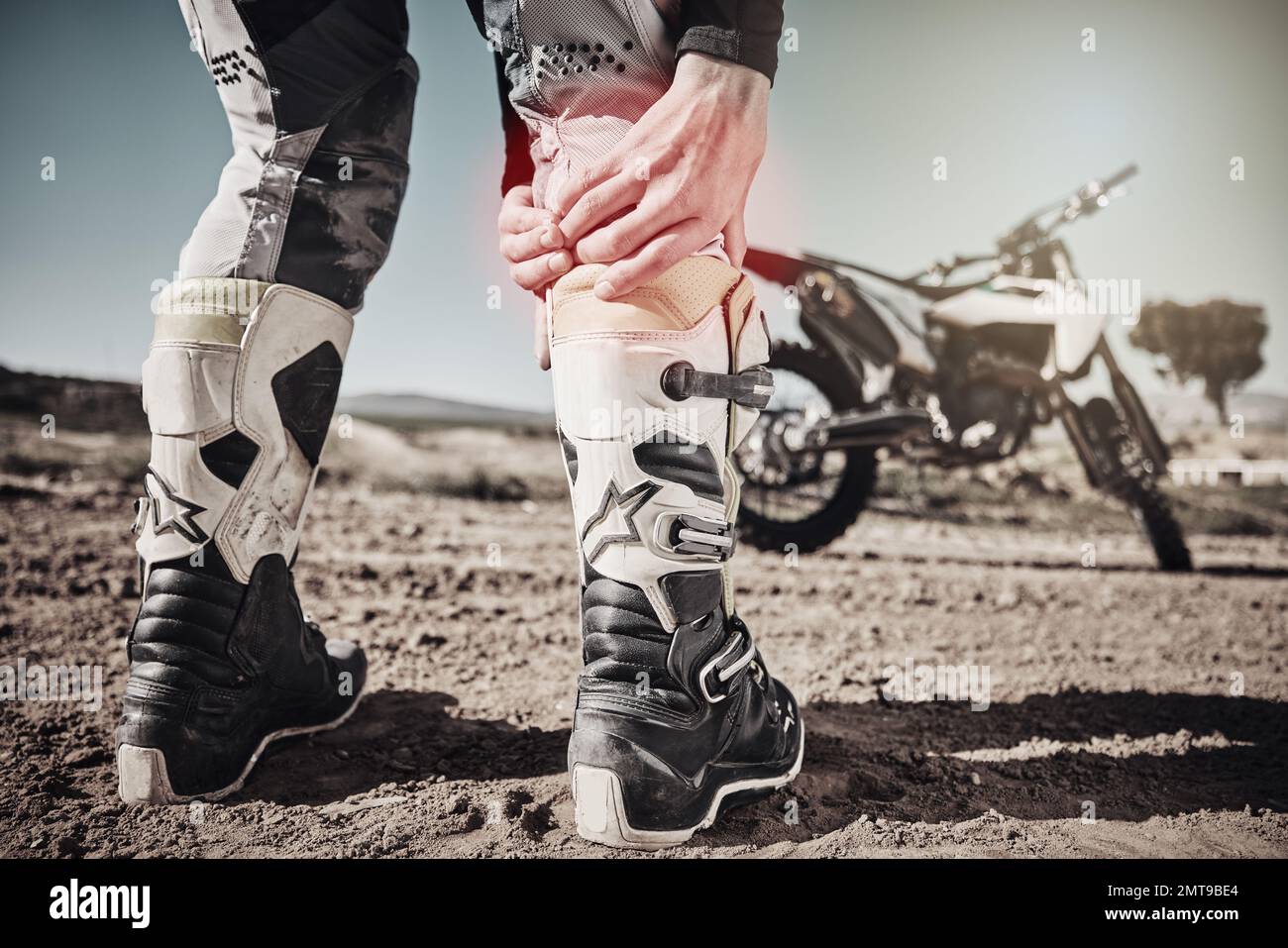 Leg pain, motorbike and man hands for race competition, training and ...
