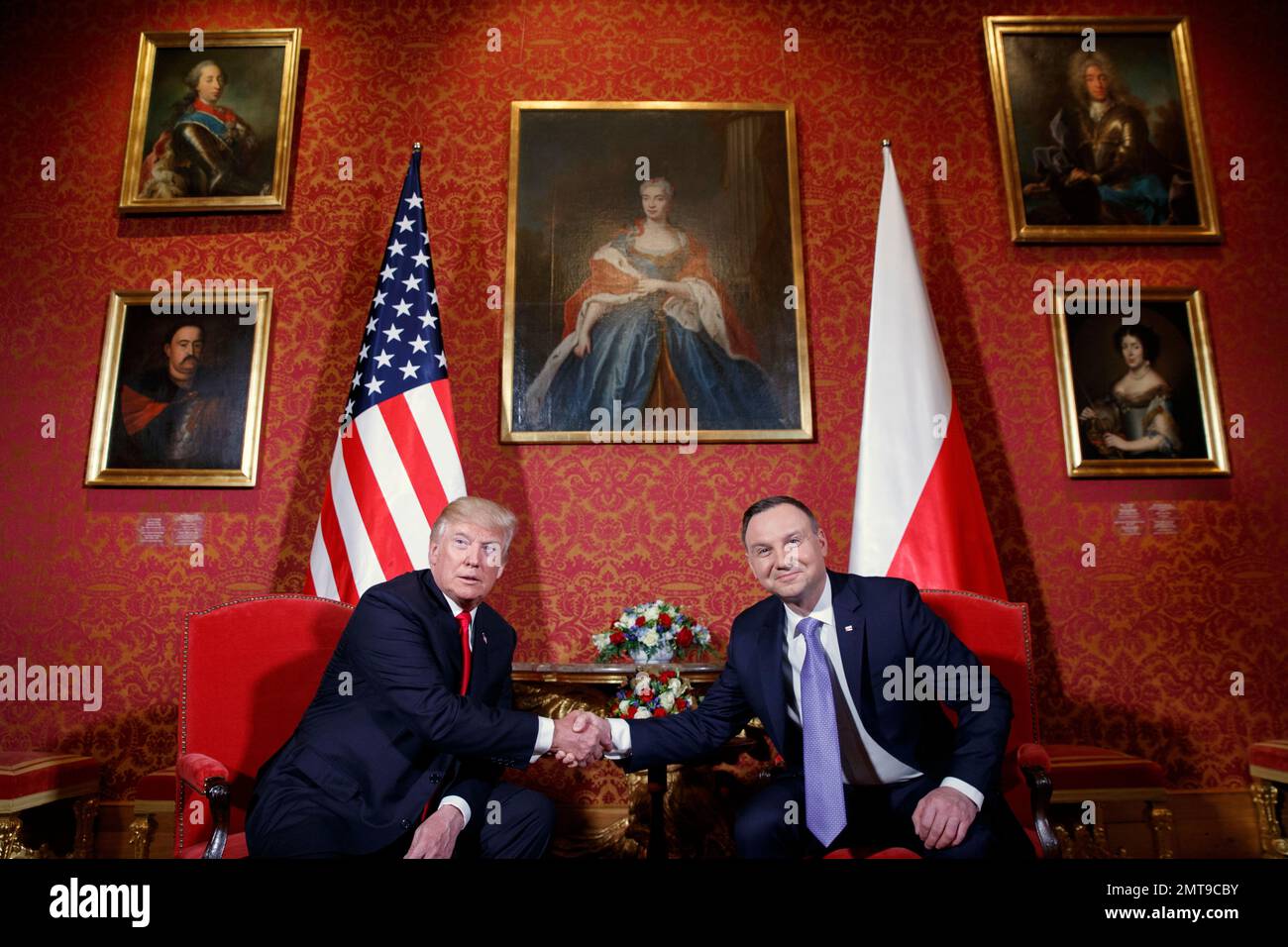 U.S. President Donald Trump, left, shakes hands with with Poland's ...