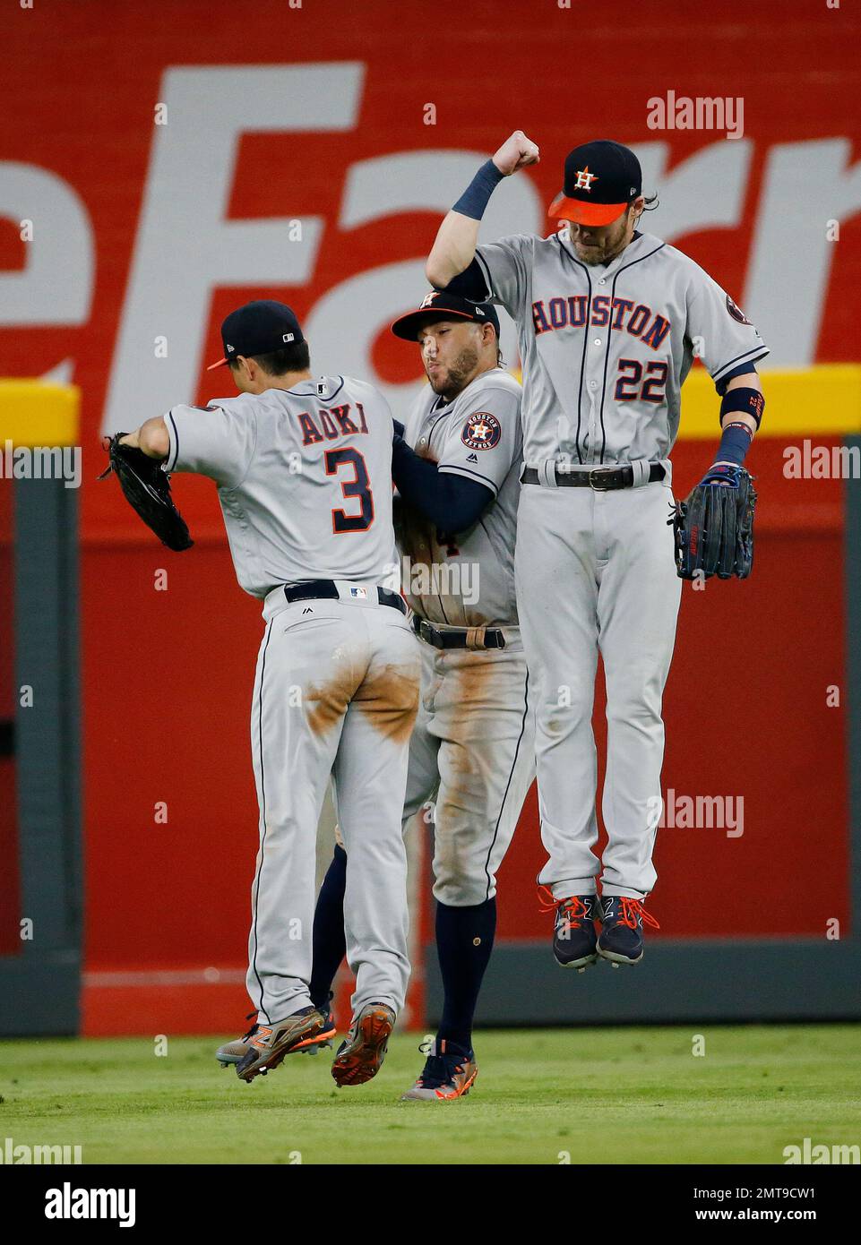 Houston Astros outfielders from left, Norichika Aoki, George Springer ...