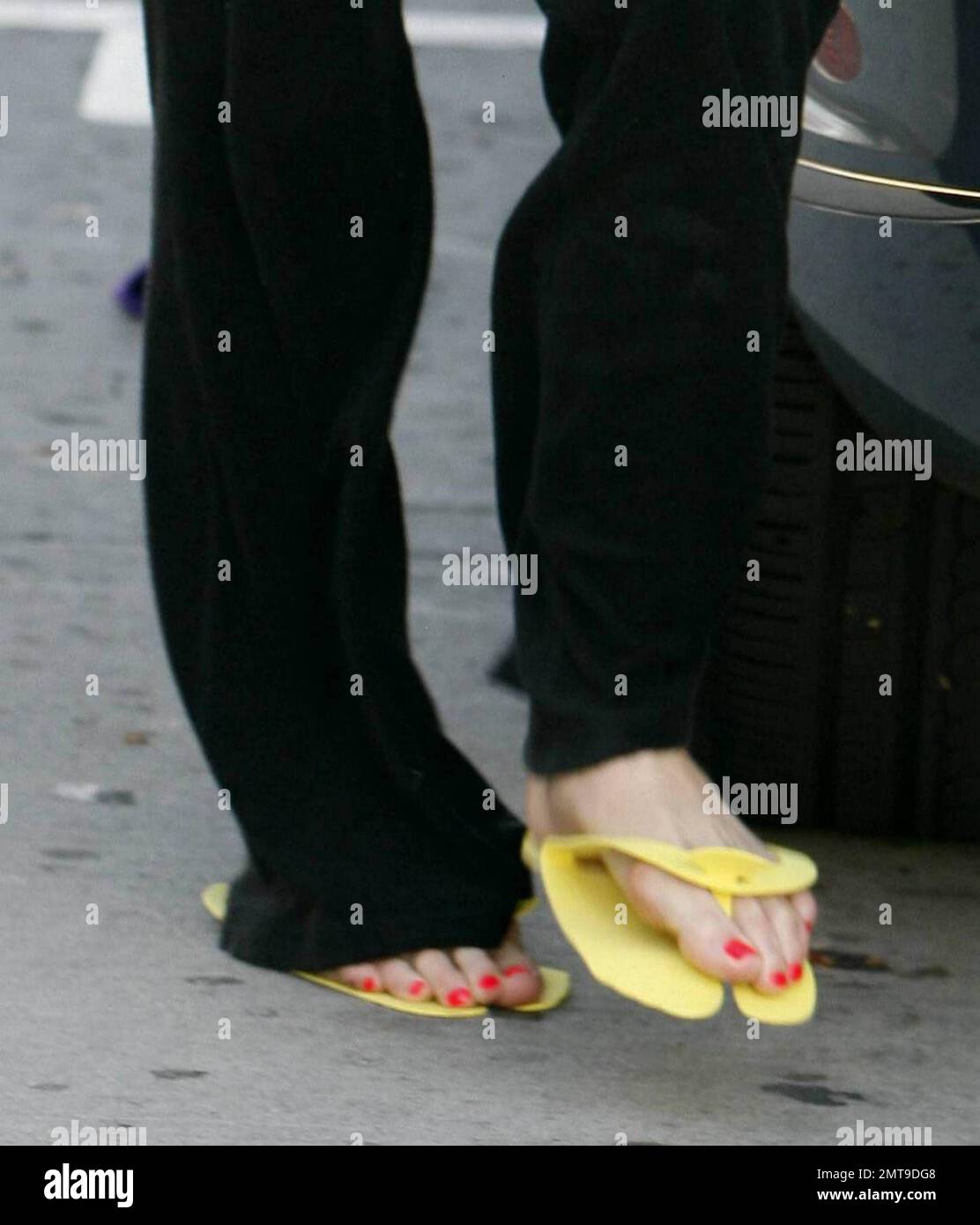 - Paris Hilton shows off her freshly painted pink toes as she continues ...