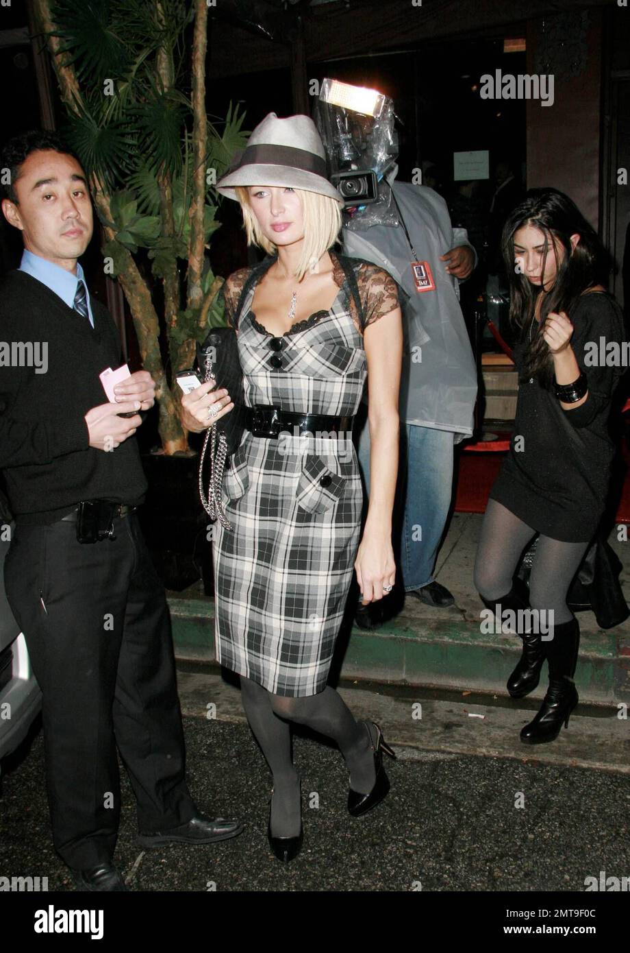 Ever the chameleon, socialite Paris Hilton sports two hair colors in ...