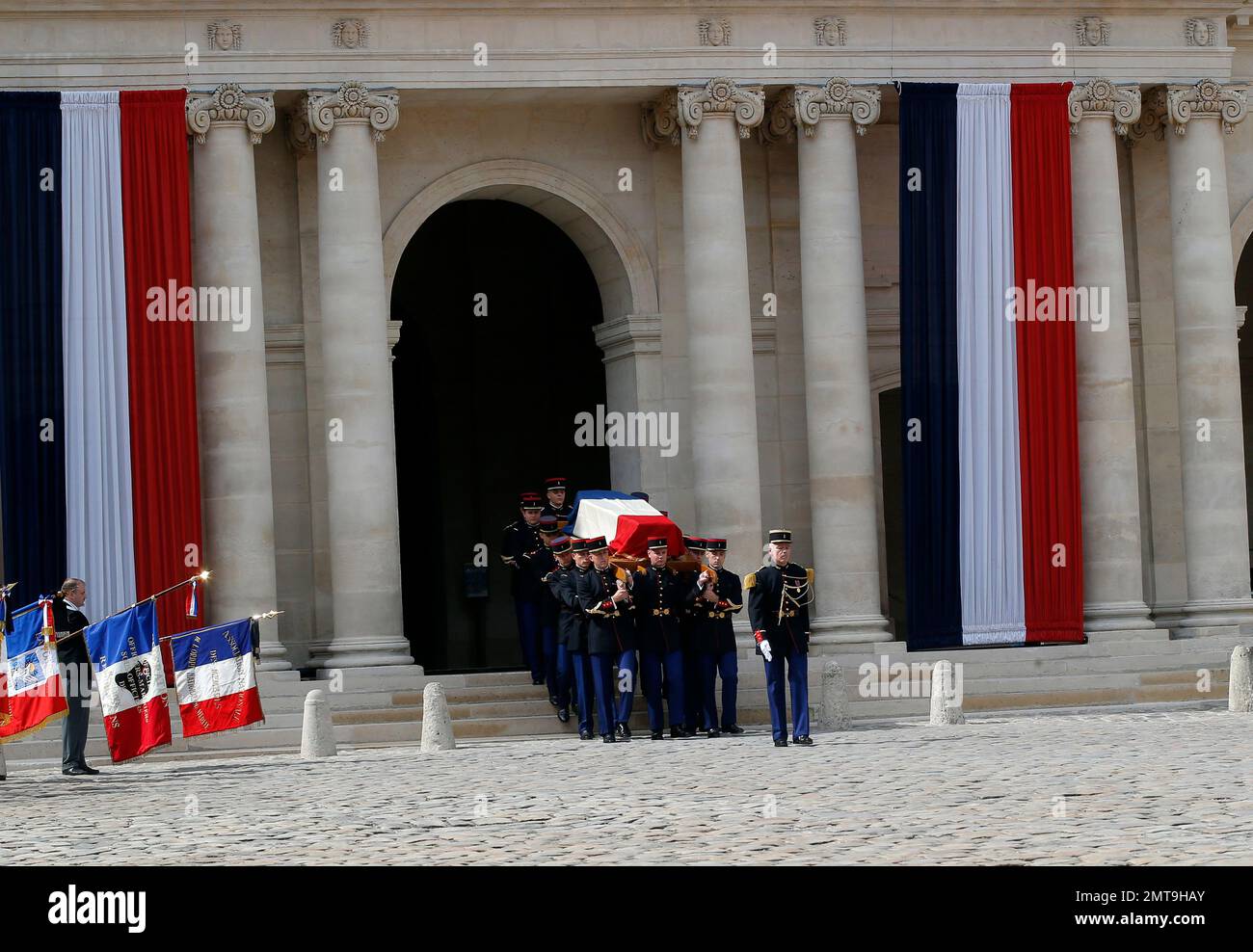 Republican guards carry the flag-draped coffin of Simone Veil during a ...