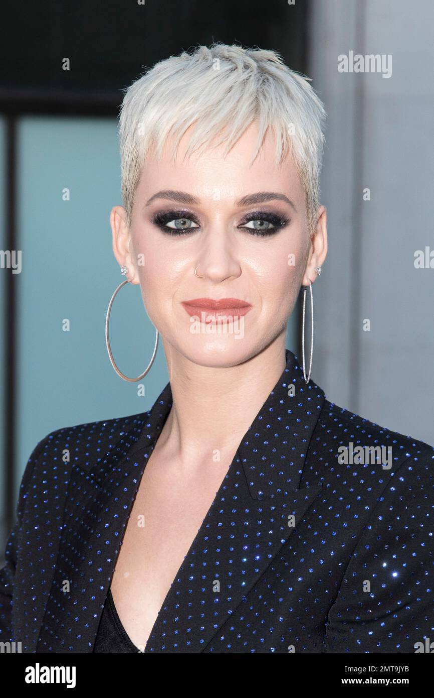 Singer Katy Perry poses for photographers as she arrives for the ...