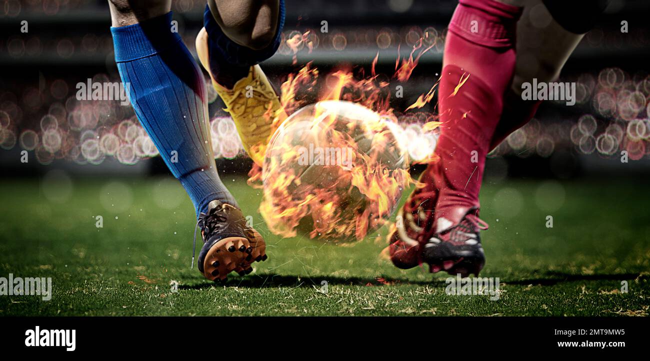 CG image of soccer players hitting the ball with fire Stock Photo - Alamy