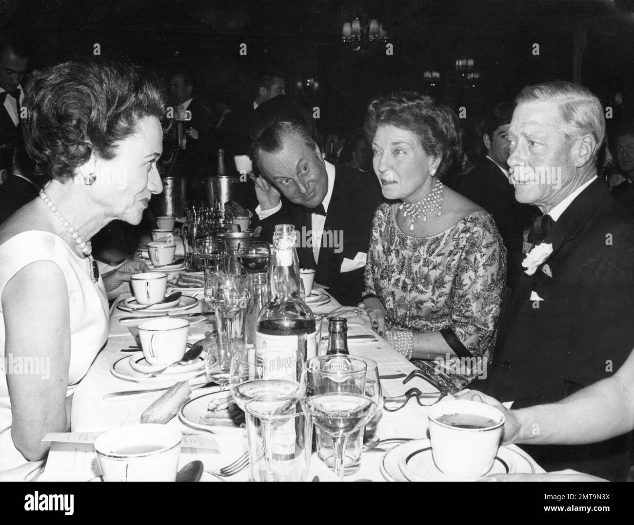 L-R: The Duchess of Windsor, unidentified man, Mona von Bismarck, the ...