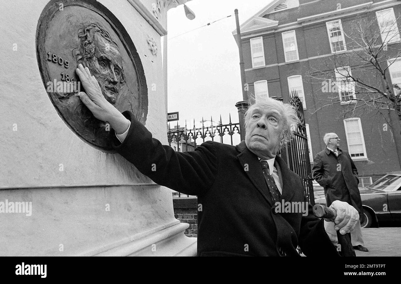 Argentine author Jorge Luis Borges, who is blind, runs his hand across ...