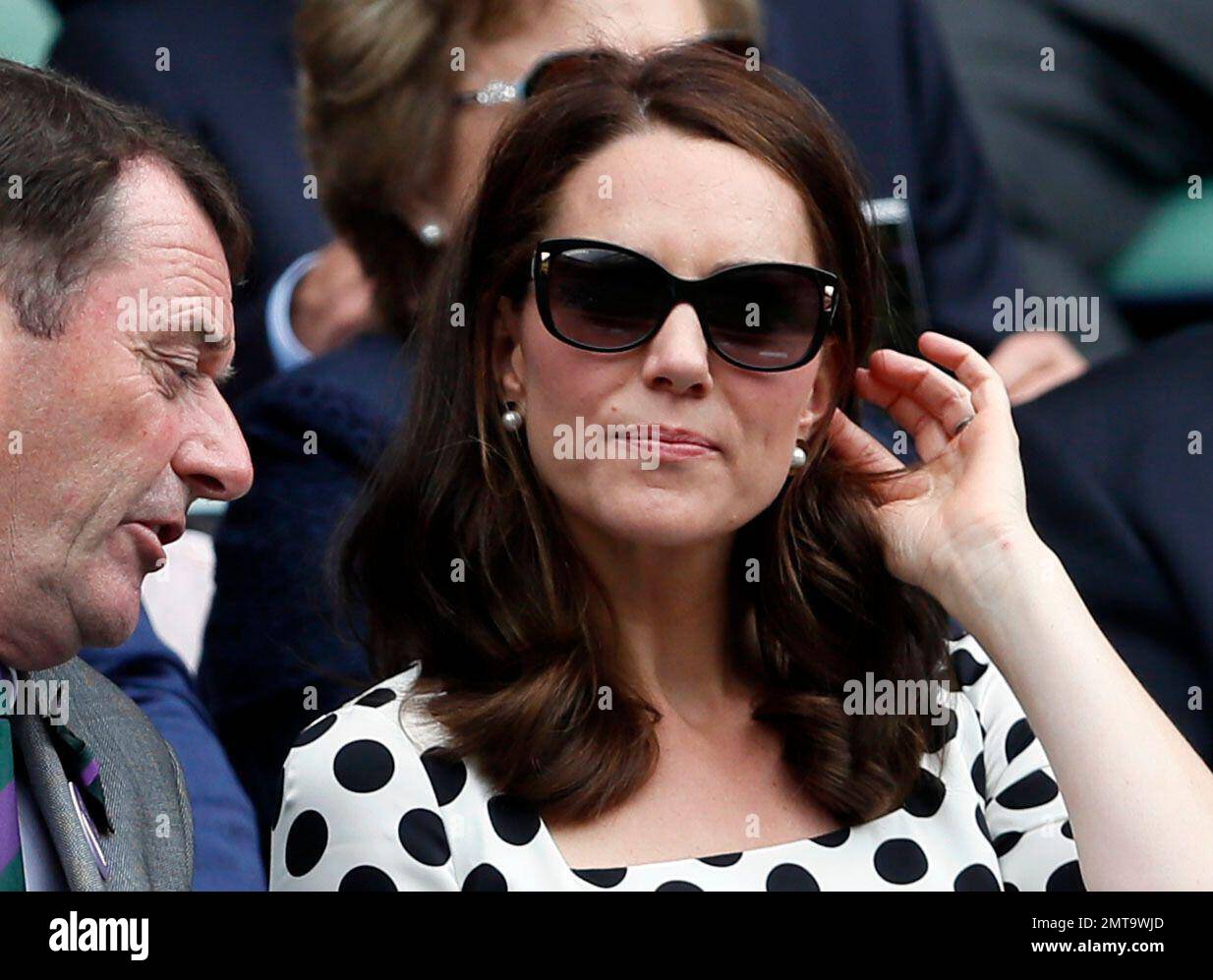 Britain's Kate, the Duchess of Cambridge watches the action in the ...