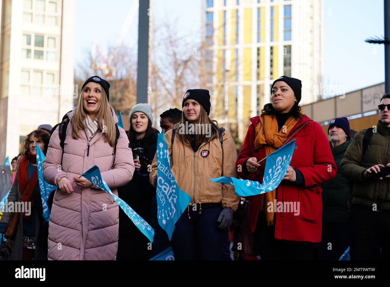 Members of the National Education Union (NEU) join fellow strikers from ...