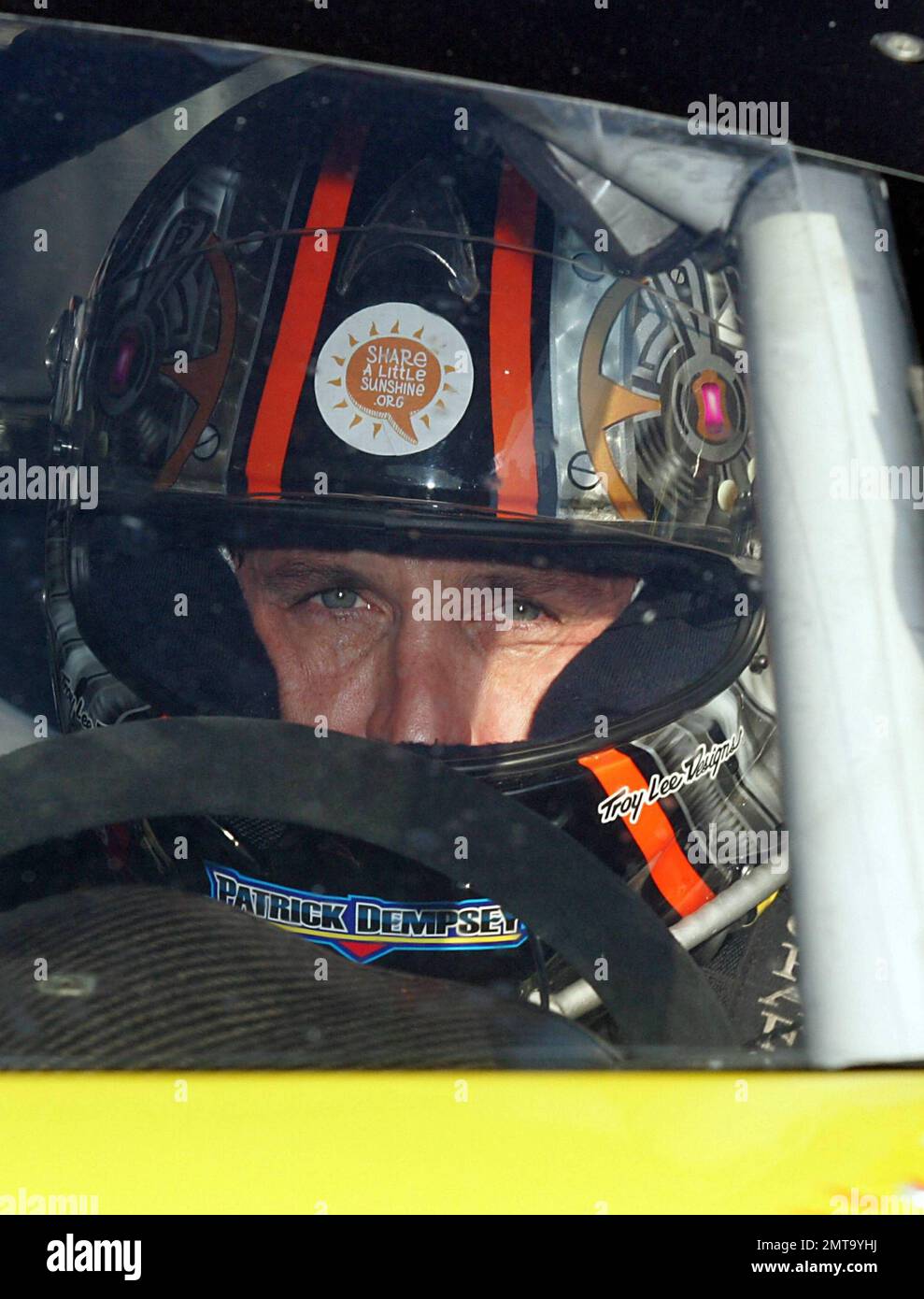 Actor Patrick Dempsey prepares to drive his car down pit road prior to ...